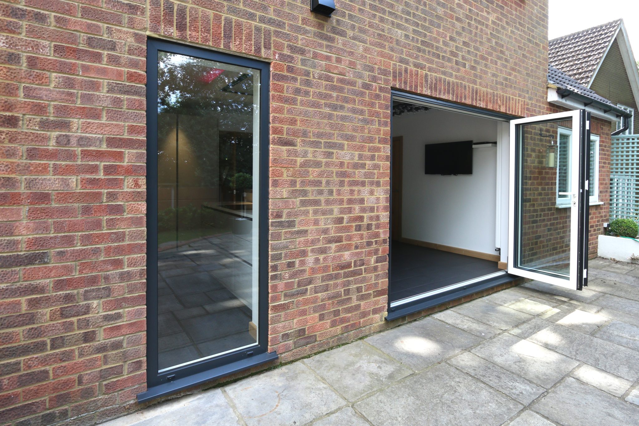 Ridgemount featuring a dual colour aluminium bifold door